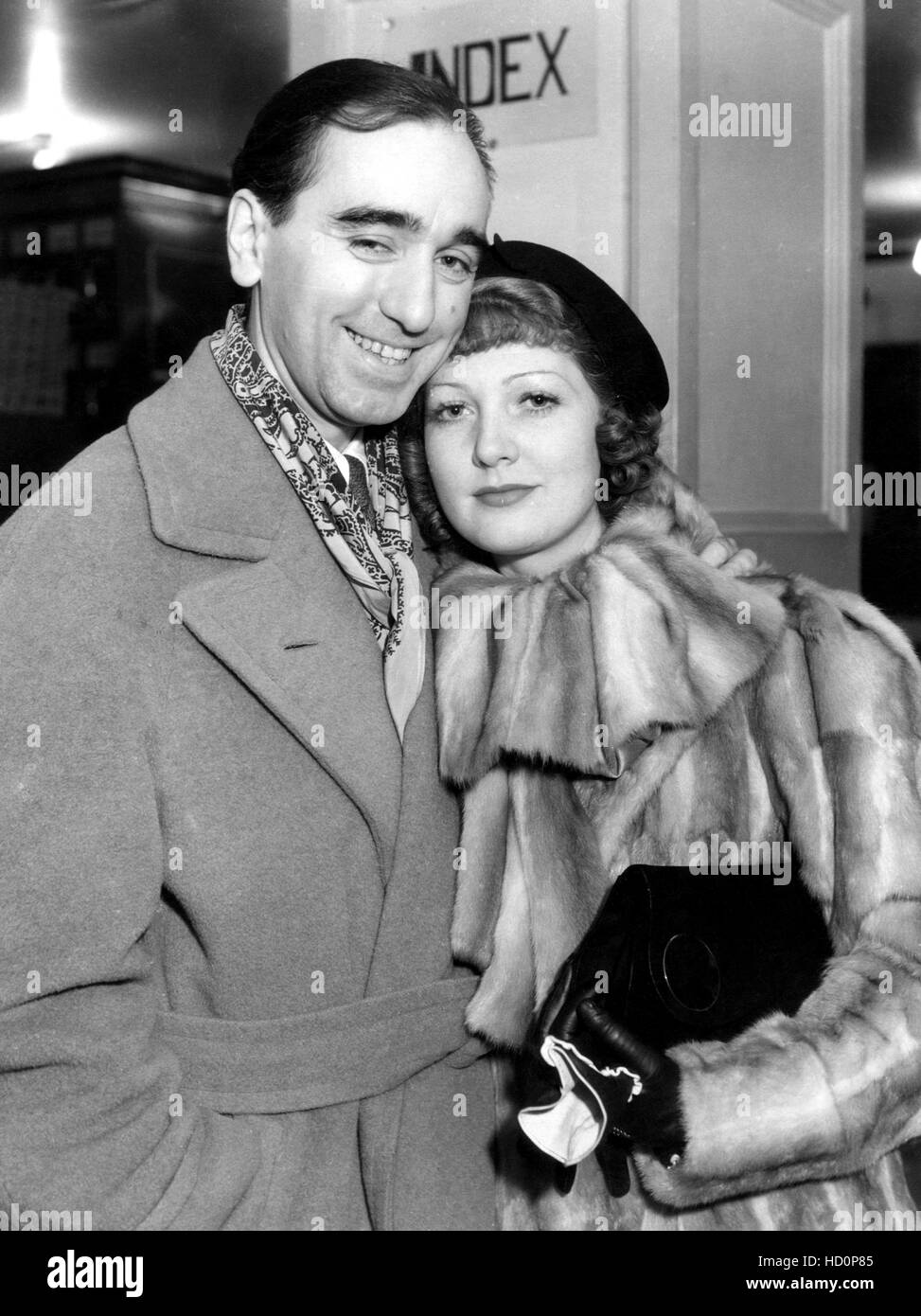 From left: Busby Berkeley, Merna Kennedy, at Marriage License Bureau ...