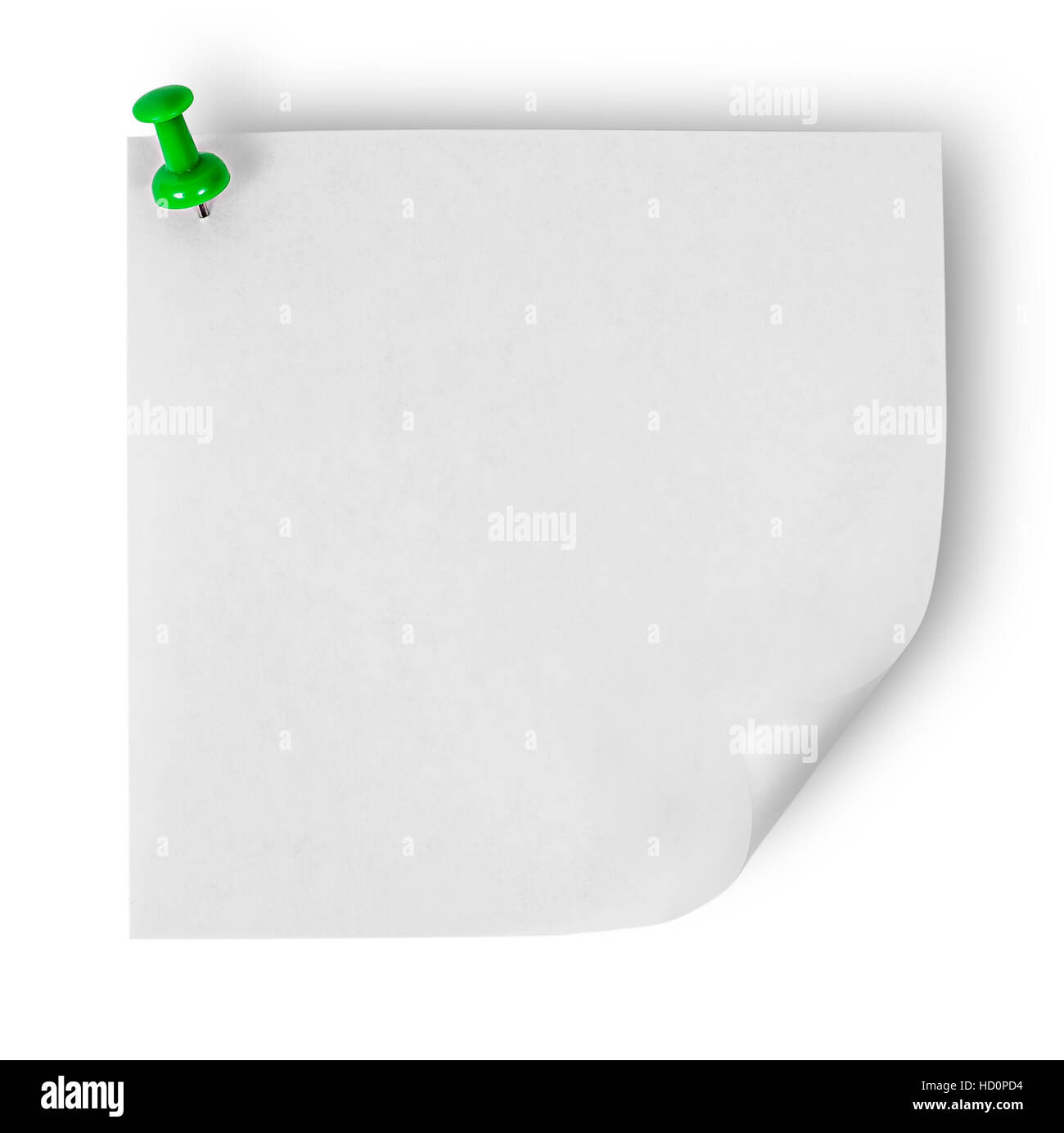 White sticker with the wrapped up corner pinned green office pin ...