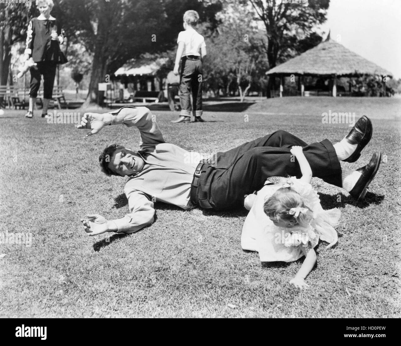 Burt Lancaster romping with daughter, Susan, 1954 Stock Photo - Alamy