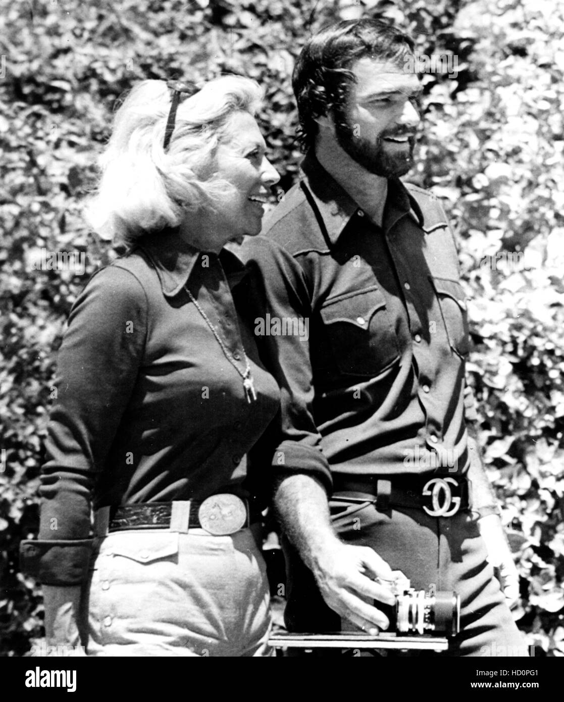 From left, Dinah Shore, Burt Reynolds, in Cypress Gardens, Florida, May ...