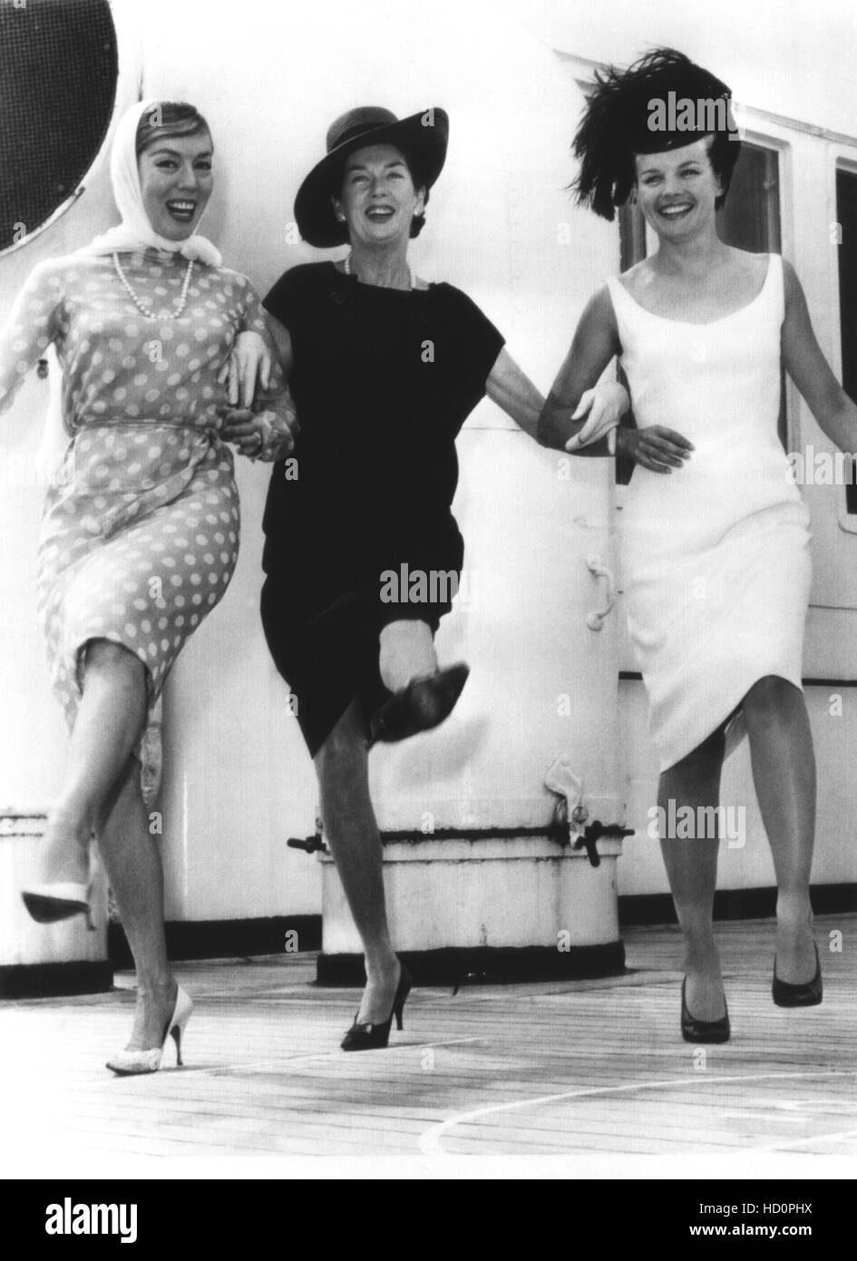 From left, Lisa Kirk, Rosalind Russell, Carroll Baker, having their ...