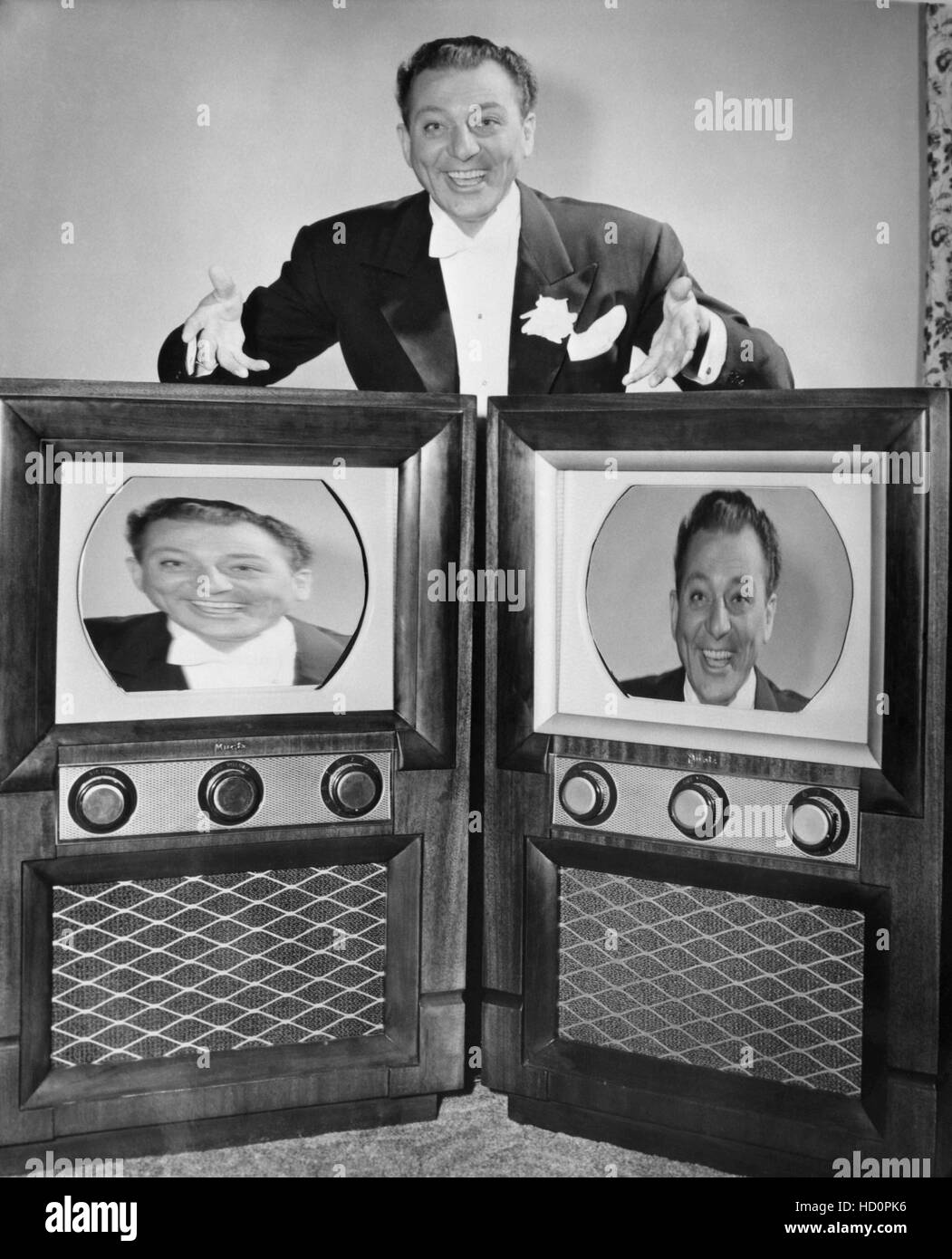 Carl Brisson demonstrating "television distortion' in his nightclub act ...