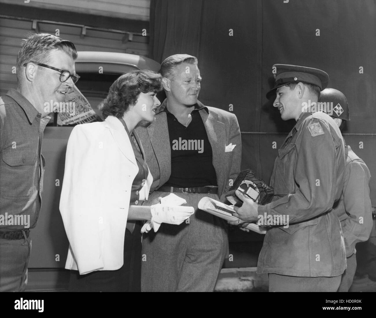 From second left: Adrian Booth, David Brian chat with Army personnel at ...