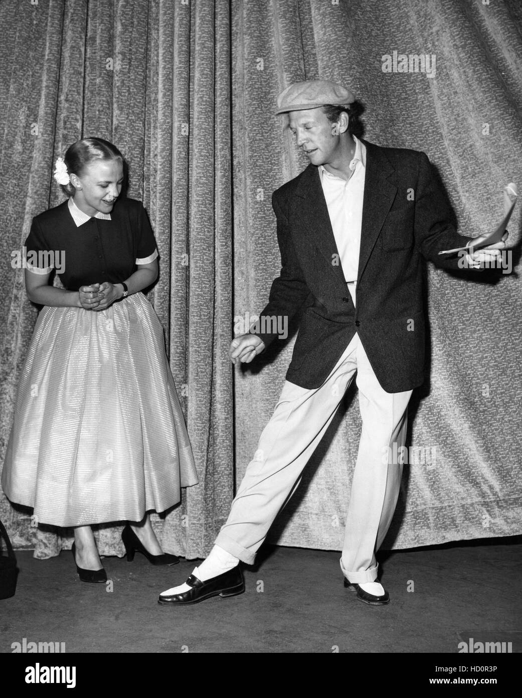 From left: Peggy Lee watching Dan Dailey rehearse dance routine for ...