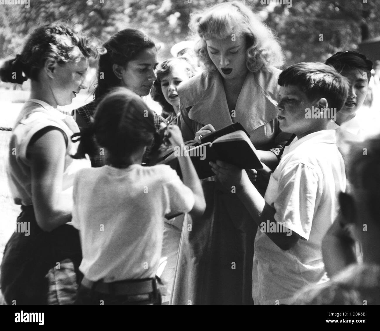 Dagmar, (aka Jeanne Lewis), signing autogaphs for young fans, 1951 ...
