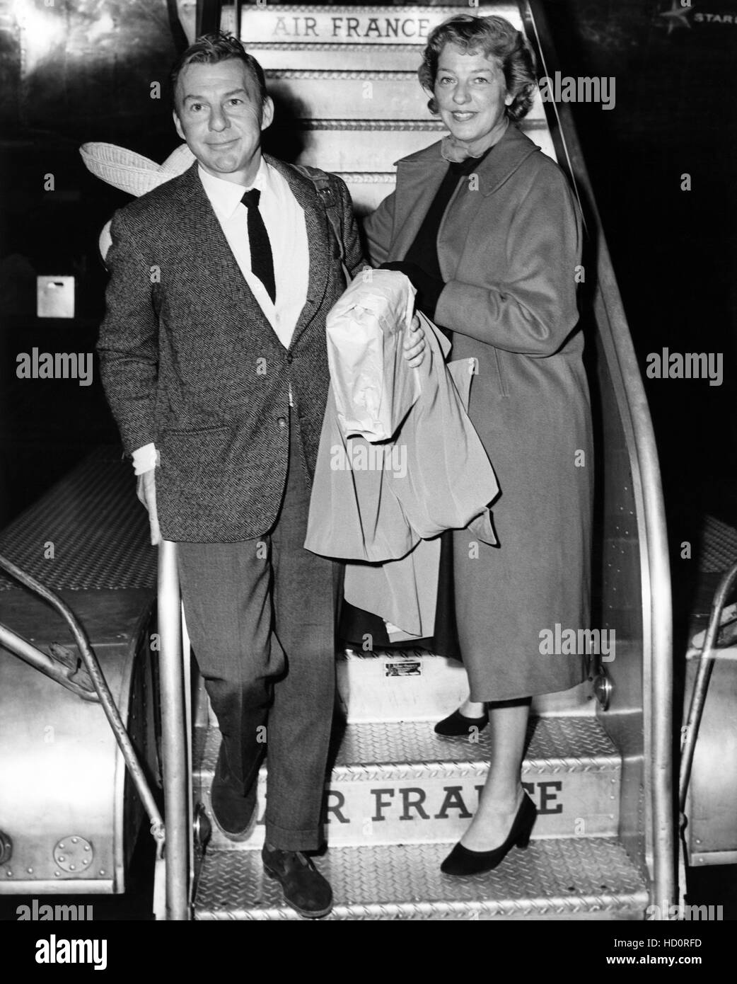 David Wayne, left, with his wife, Jane Wayne, at Idlewild Airport after ...