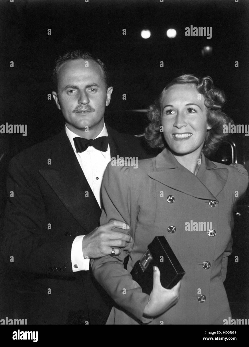 DARRYL F. ZANUCK and wife VIRGINIA FOX ZANUCK out on the town, c. late ...