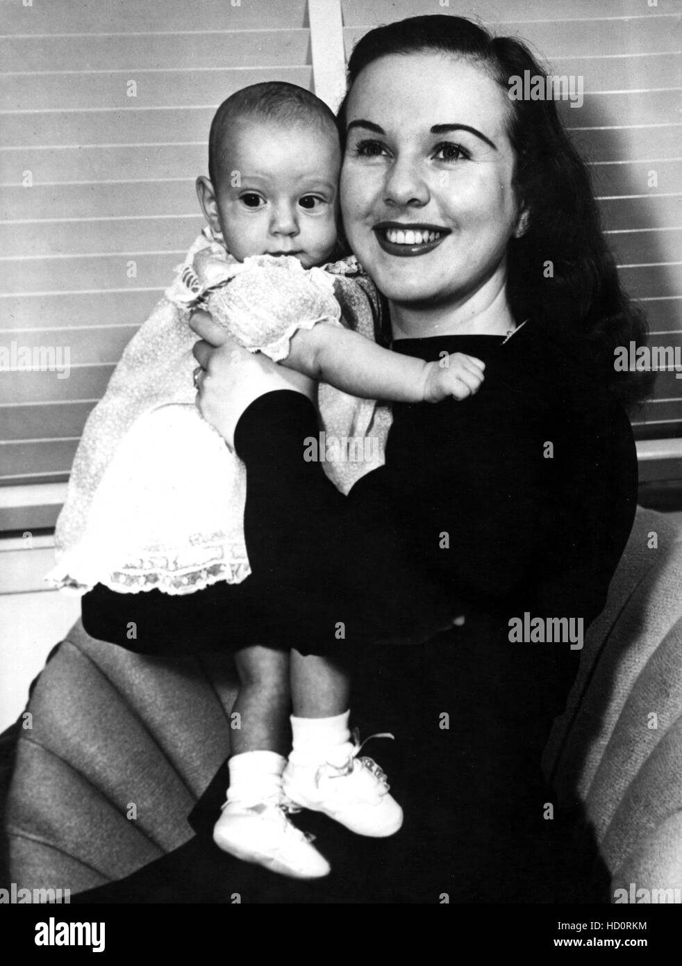Deanna Durbin holding infant daughter Jessica Louise Jackson, 1946 ...