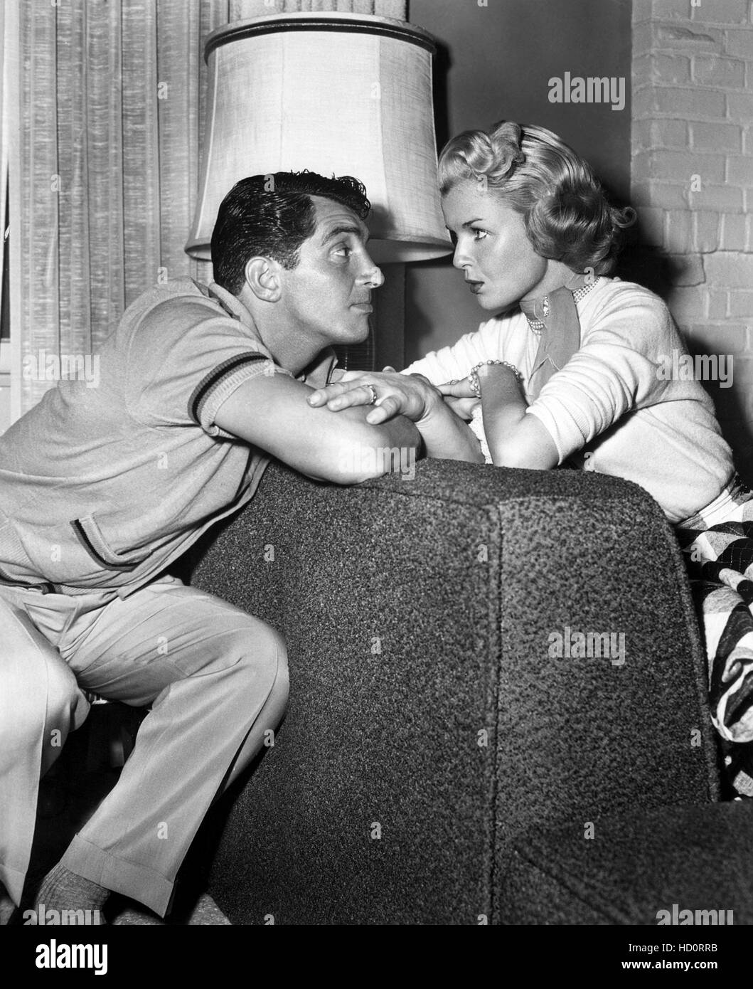 DEAN MARTIN and wife JEANNIE MARTIN enjoy a quiet moment together, 1952 ...