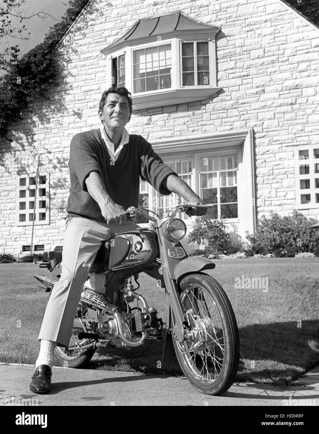Dean Martin outside his Beverly Hills home on his Honda motorcycle ...