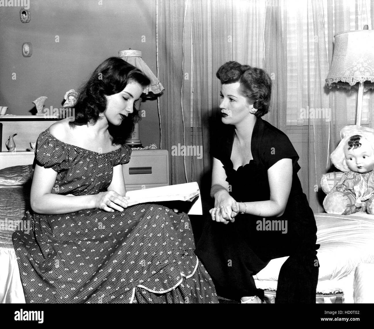 Debra Paget studies a script with her sister Teala Loring, ca. 1947 ...