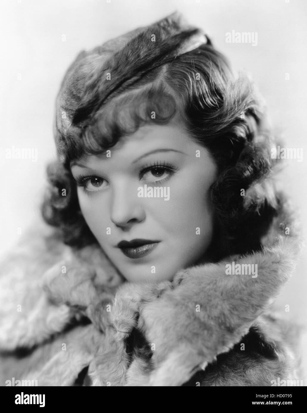 Dixie Dunbar, modeling a gray kidskin hat, 1936 Stock Photo - Alamy