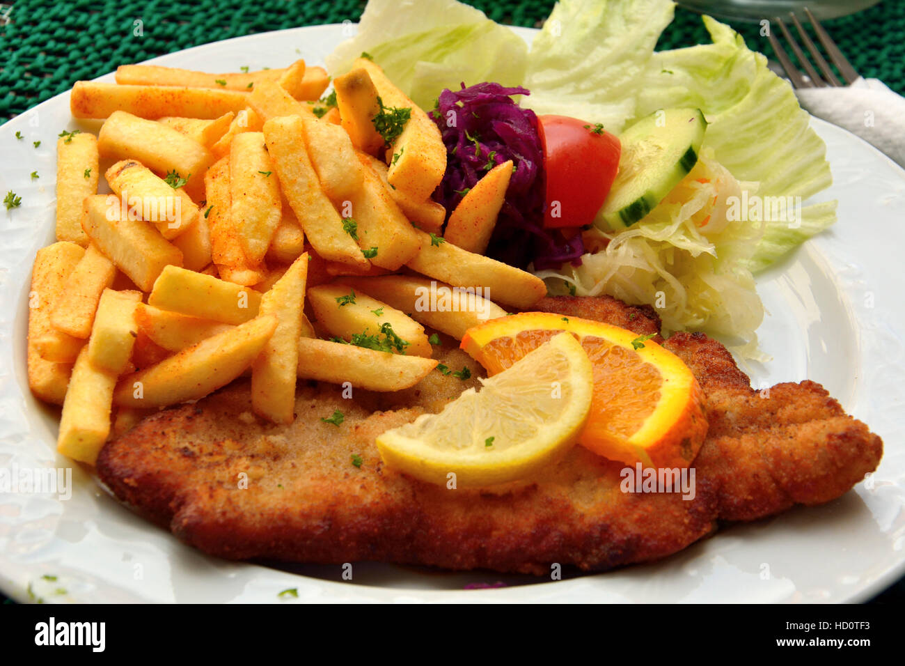Schnitzel with french fries Stock Photo - Alamy