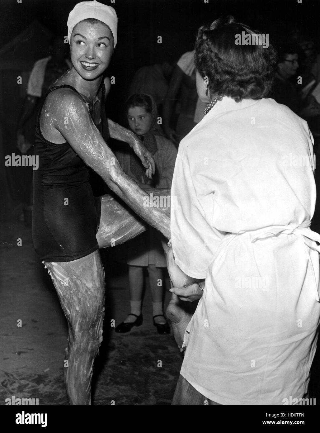 DANGEROUS WHEN WET, Esther Williams gets greased for her English ...