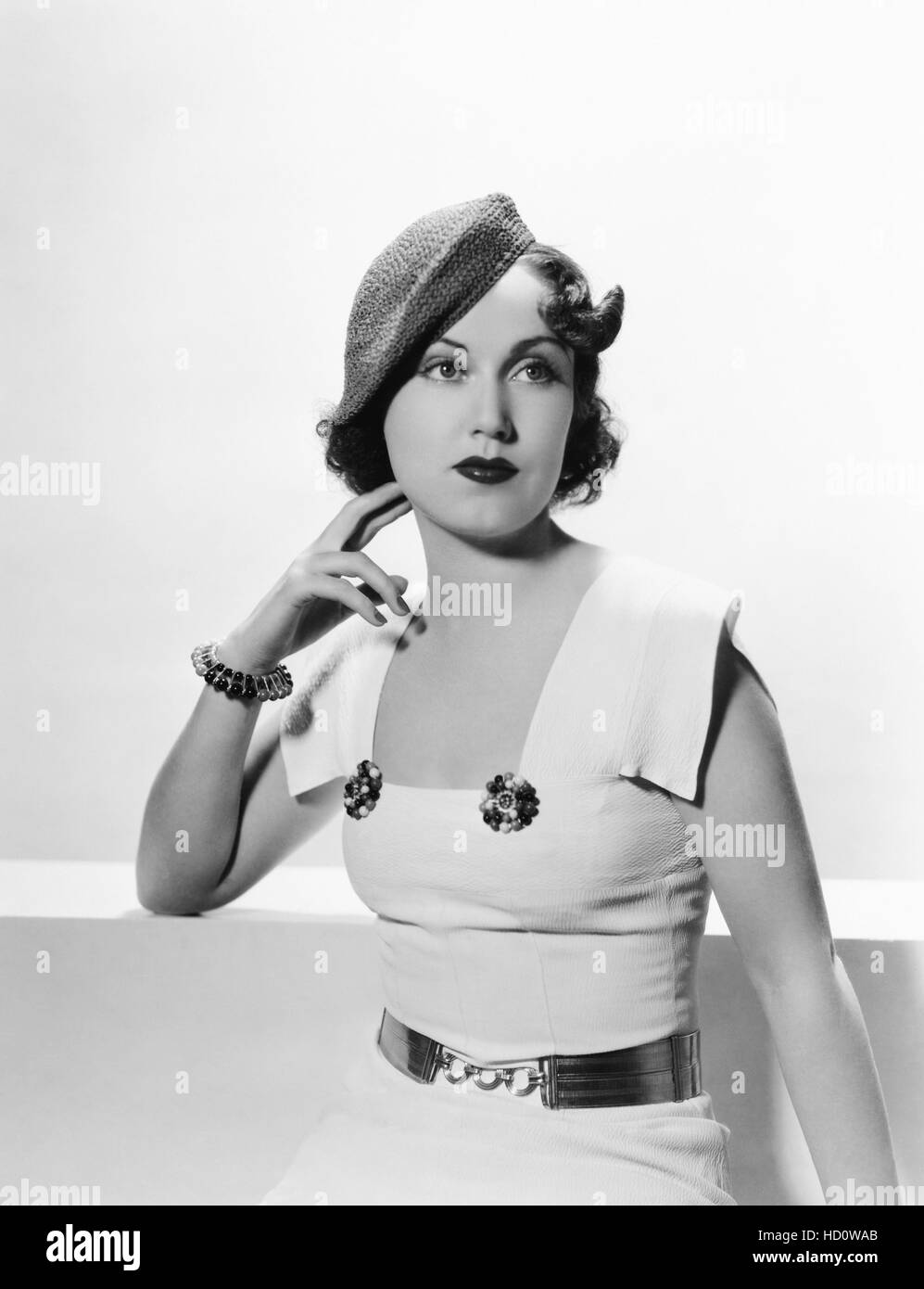 Fay Wray, wearing a 'puff bracelet' of circle clips, 1934 Stock Photo ...