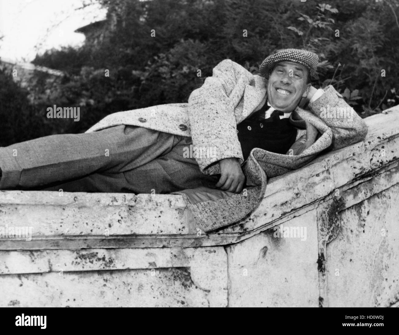 Fernandel, relaxing on the Spanish Steps in Rome, November 1957 Stock ...