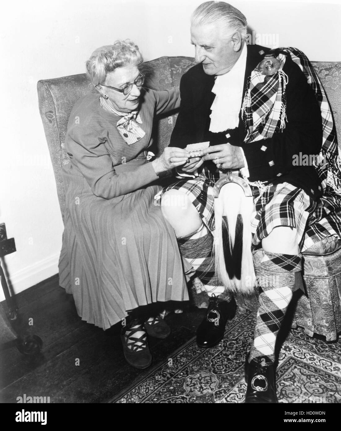 Finlay Currie (right) showing his wife Maude Currie the latest addition ...