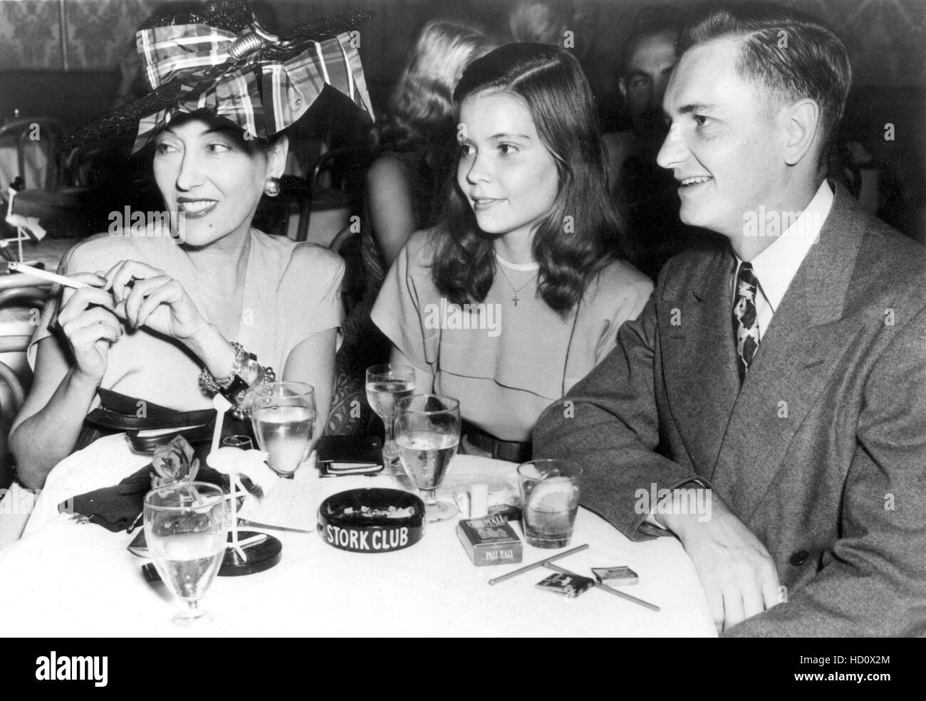 Gloria Swanson dining at the Stork Club in New York City with her ...