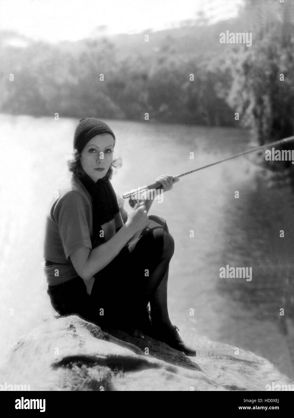 GRETA GARBO, fishing, 1930s Stock Photo - Alamy
