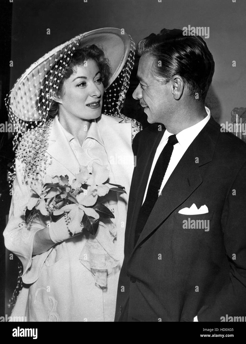 Newlyweds Greer Garson and husband E.E. Fogelson on their wedding day ...
