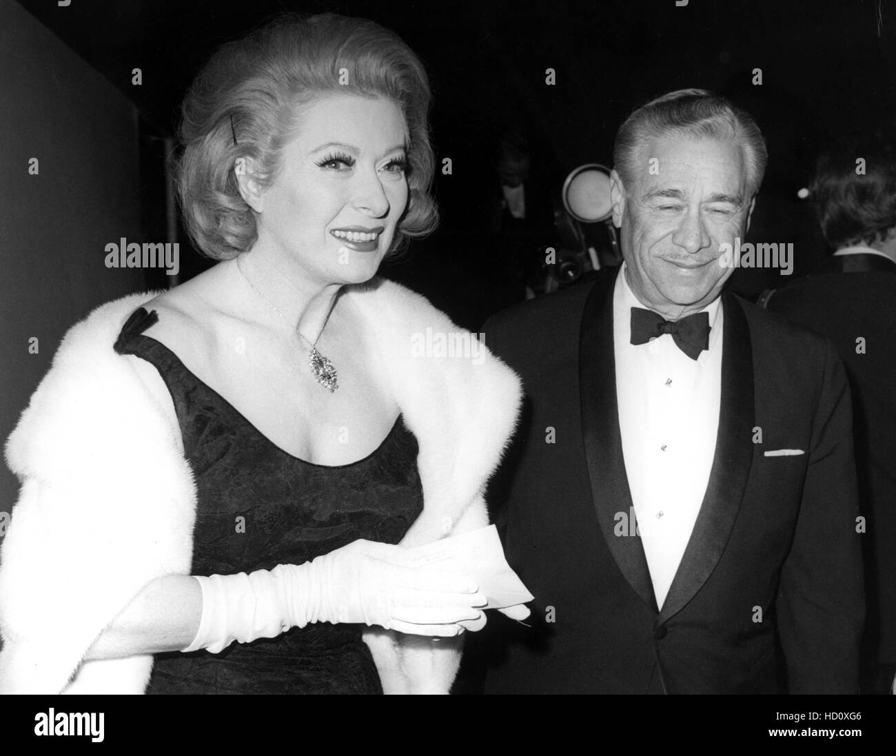 Greer Garson and husband E.E. Fogelson attend the 37th Annual Academy ...