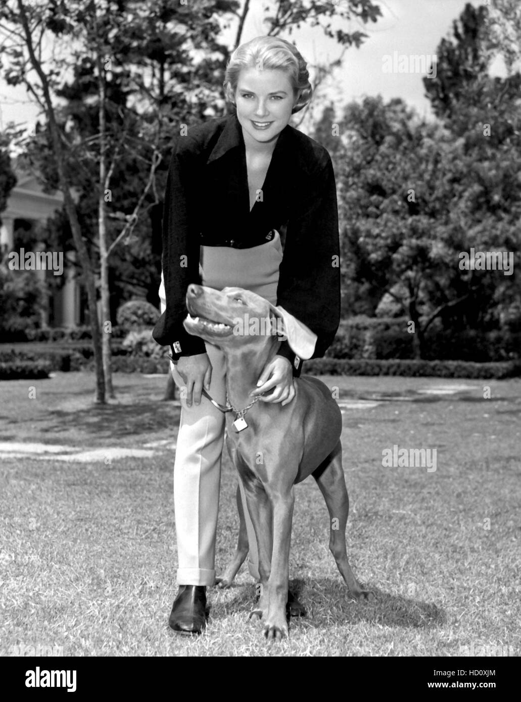Grace Kelly with her dog, 1954 Stock Photo - Alamy