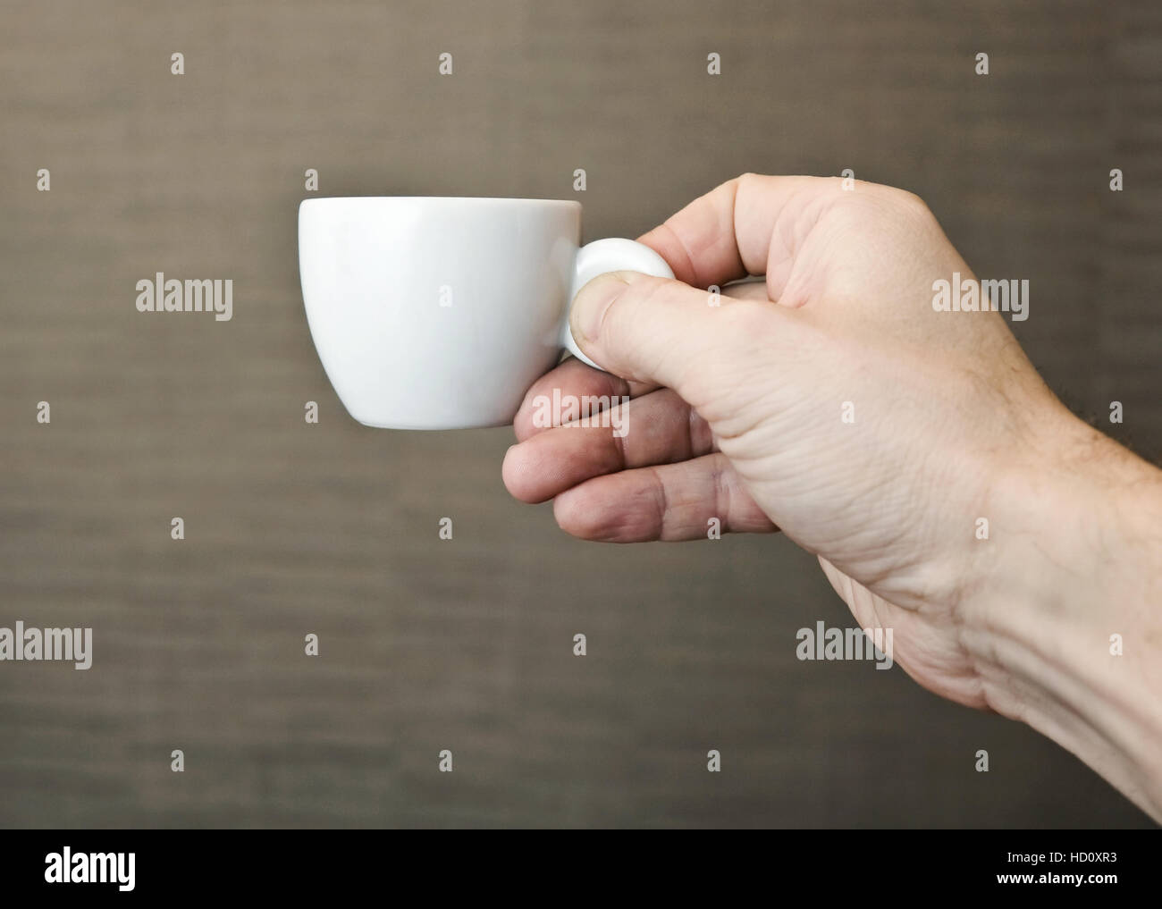 Hand and coffee cup hi-res stock photography and images - Alamy