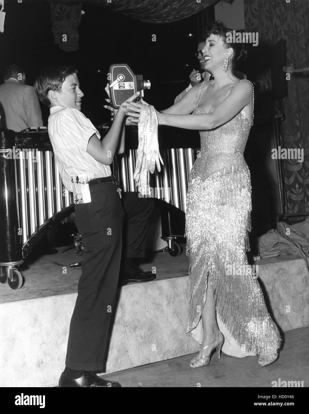 Gypsy Rose Lee, and her son, Erik Lee Preminger, on the set of SCREAMING MIMI, 1958 Stock Photo ...