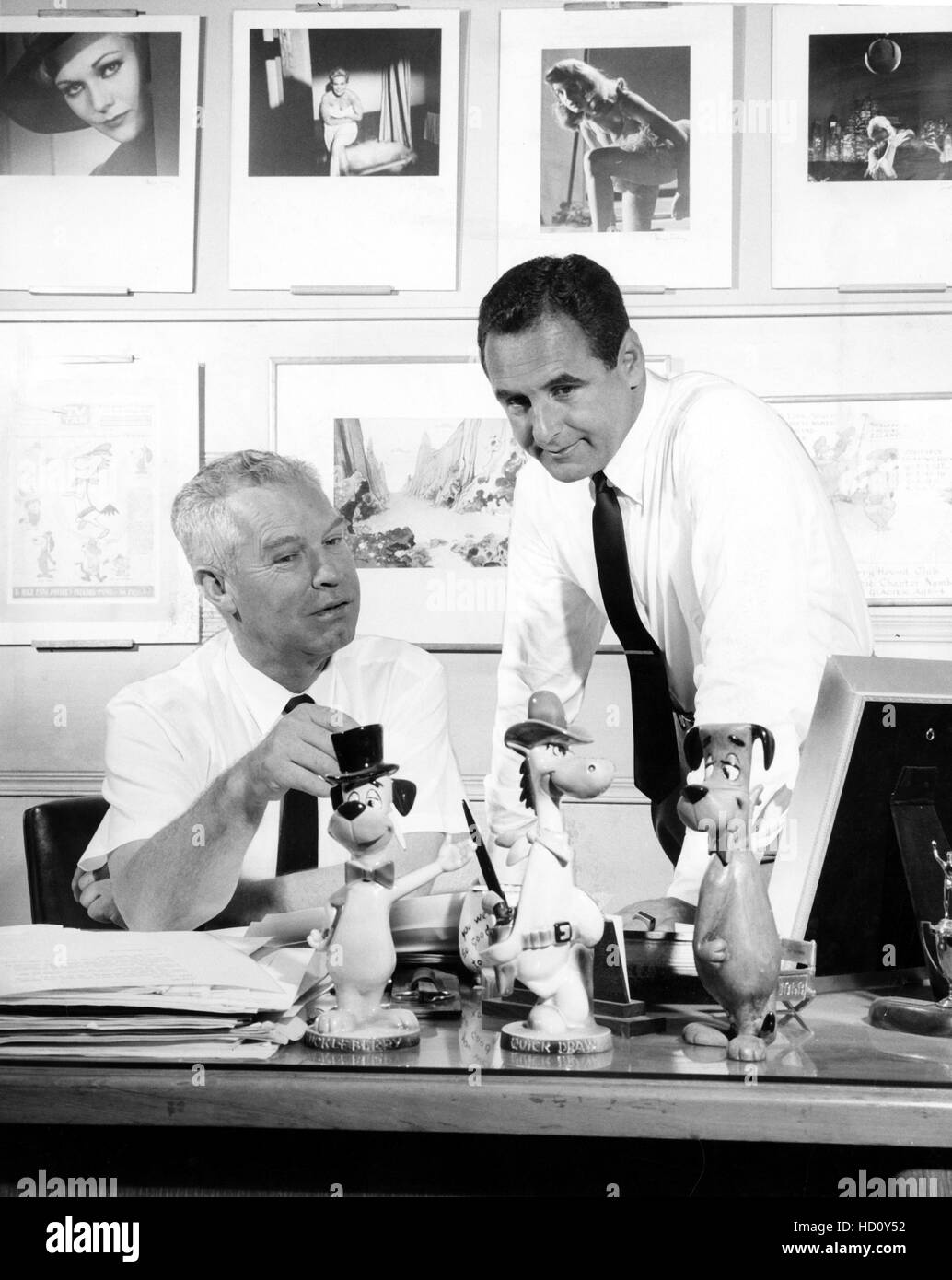 William Hanna and Joseph Barbera, in their office, with their cartoon ...