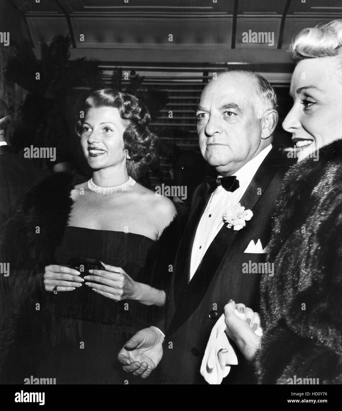 Rita Hayworth, left, with Columbia's Harry Cohn and his second wife ...
