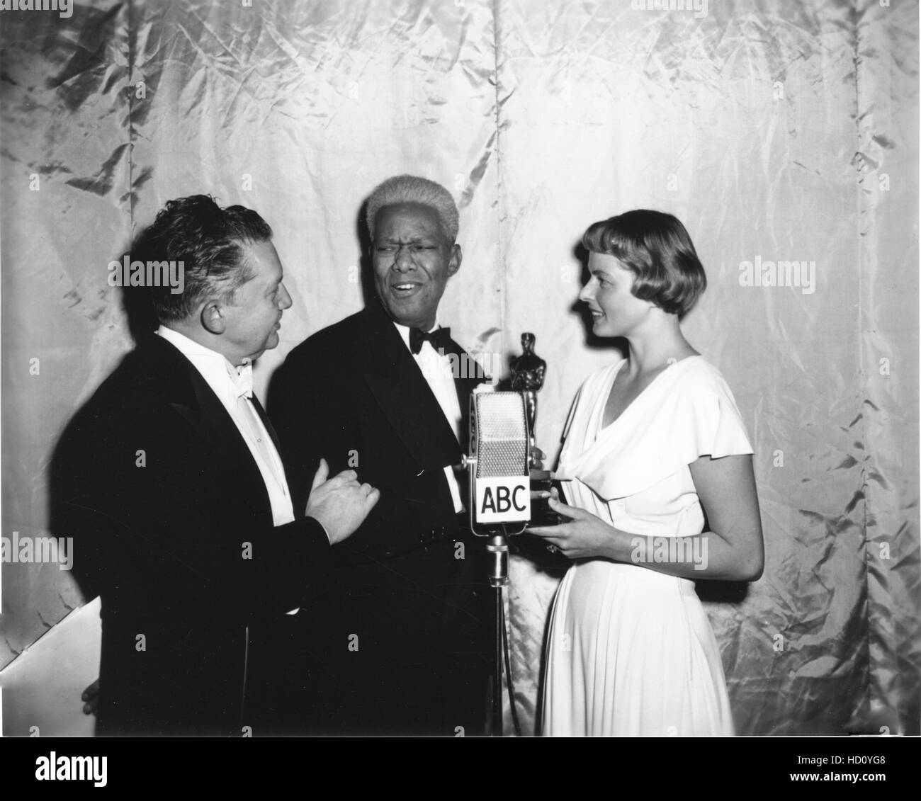 From left, Jean Hersholt, James Baskett, (receiving his Oscar for SONG ...