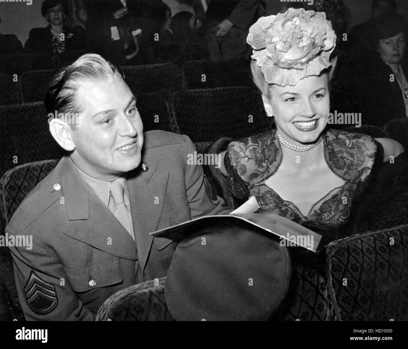 From left: Lou Busch and wife Janet Blair at movie theater, 1945 Stock ...