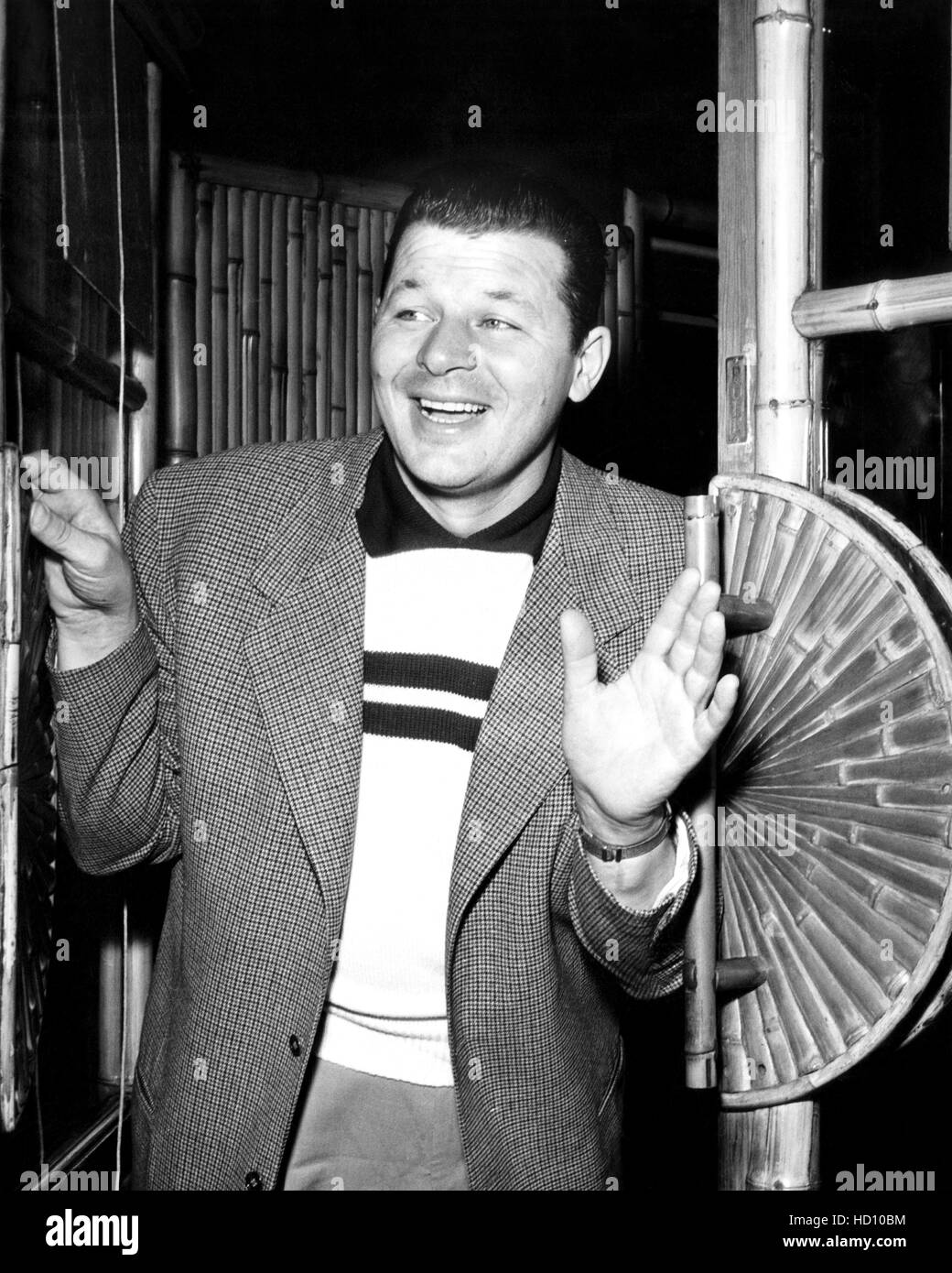 Jack Carson waving to fans in front of the Brown Derby, ca. early 1950s ...
