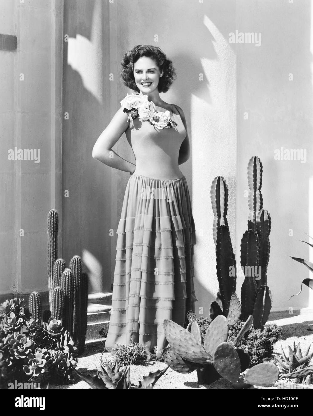 Janis Carter in chiffon gown designed by Juliette Gallian, 1948 Stock ...