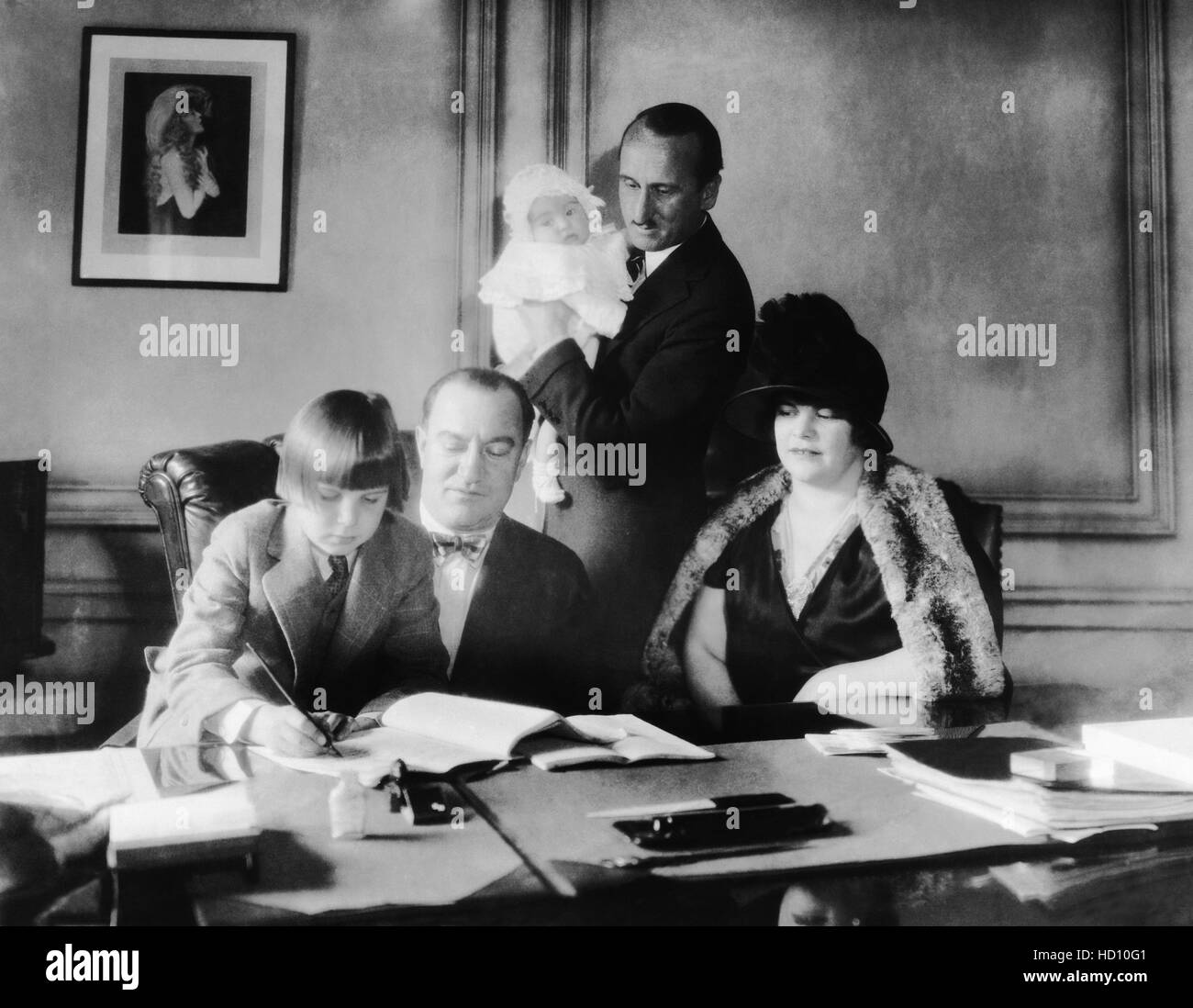Jackie Coogan, (signing Metro Goldyn contract), Metro Goldwyn vice ...