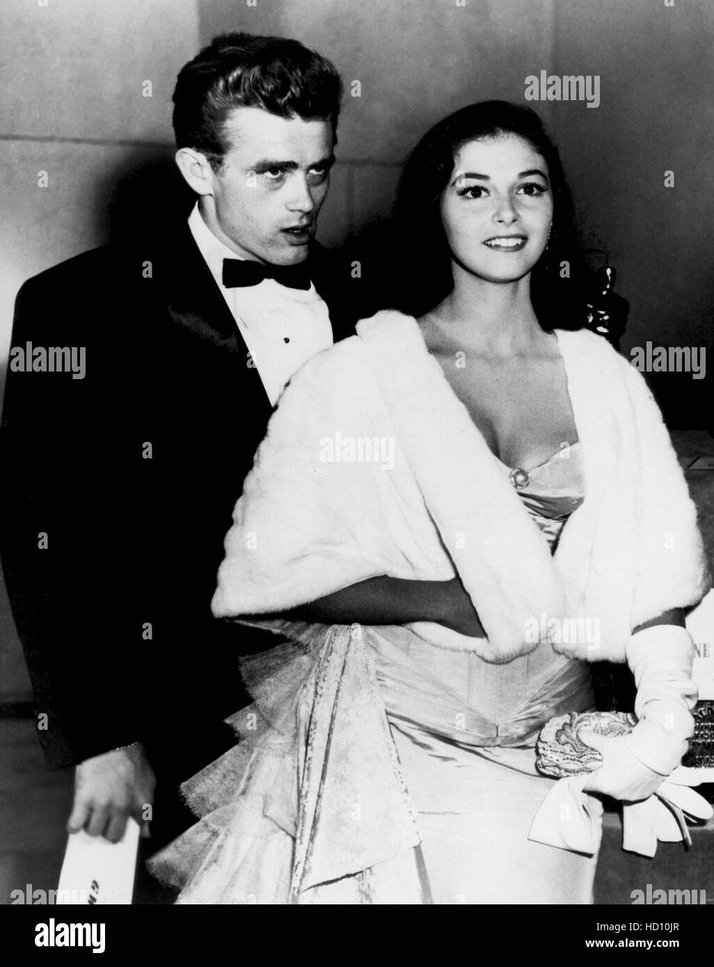 JAMES DEAN escorts his girl friend PIER ANGELI to a Hollywood premiere ...