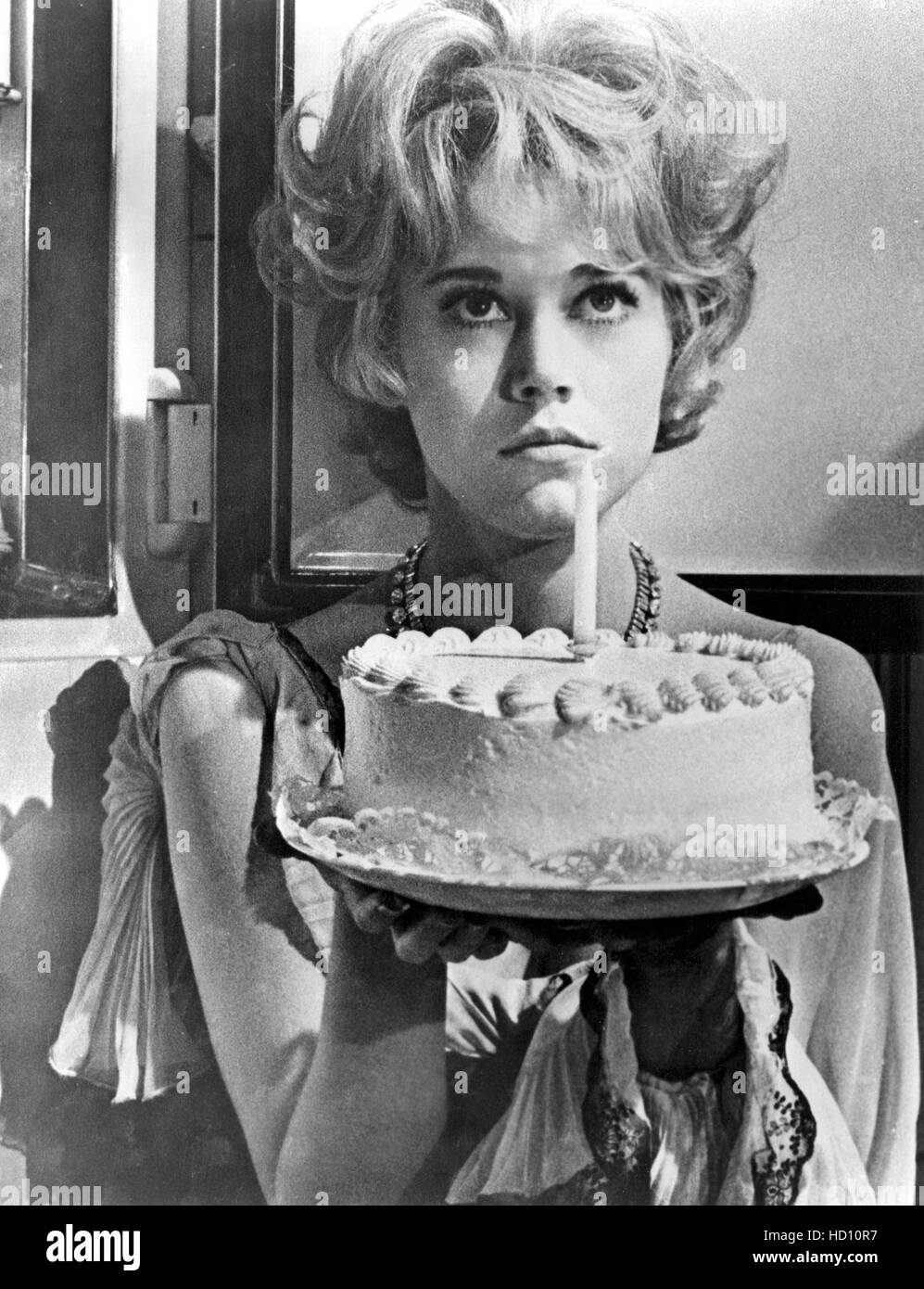 Jane Fonda, ANY WEDNESDAY, 1966, holding birthday cake Stock Photo - Alamy