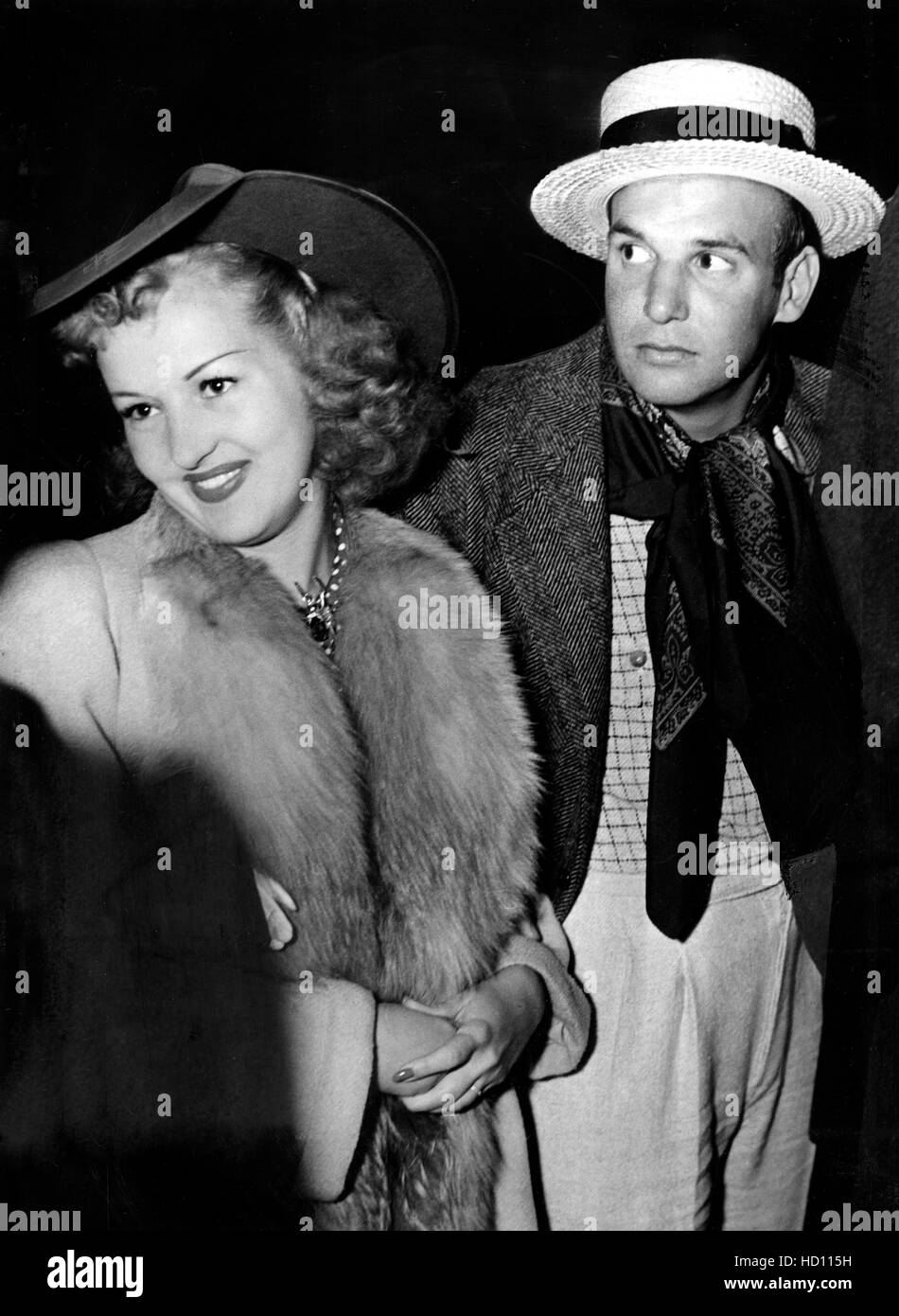 Betty Grable, and husband Jackie Coogan at the Gilmore Stadium in Los ...