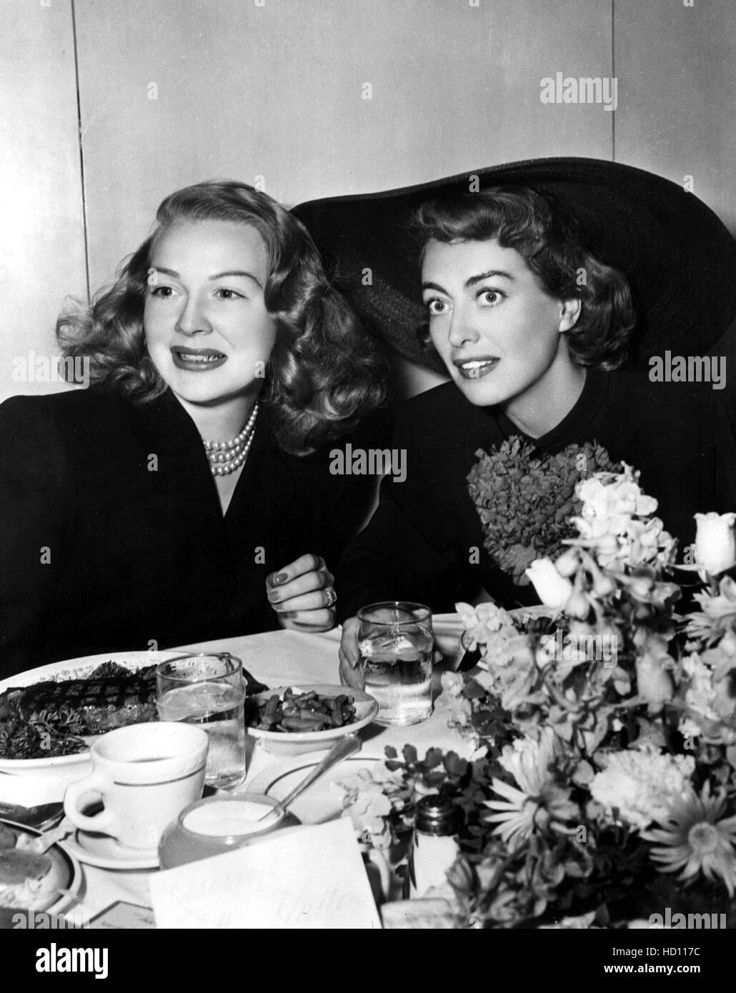 BETTY HUTTON gets a visit from JOAN CRAWFORD; Paramount commissary ...