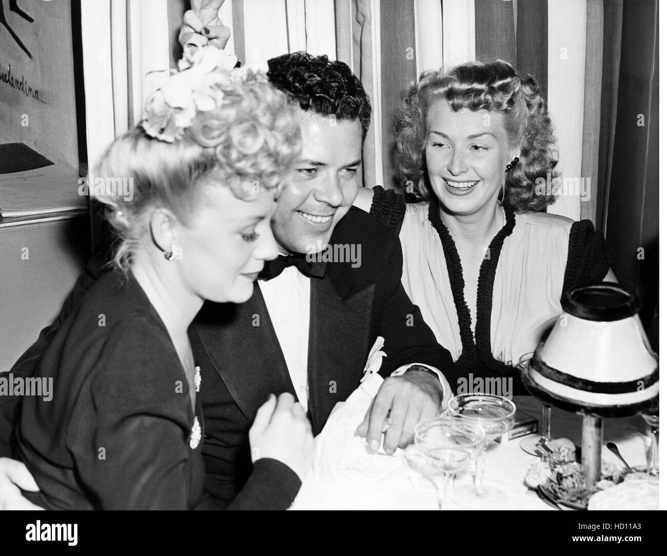 From left, Betty Hutton, makeup artist Bud Westmore, Rosemary Lane ...