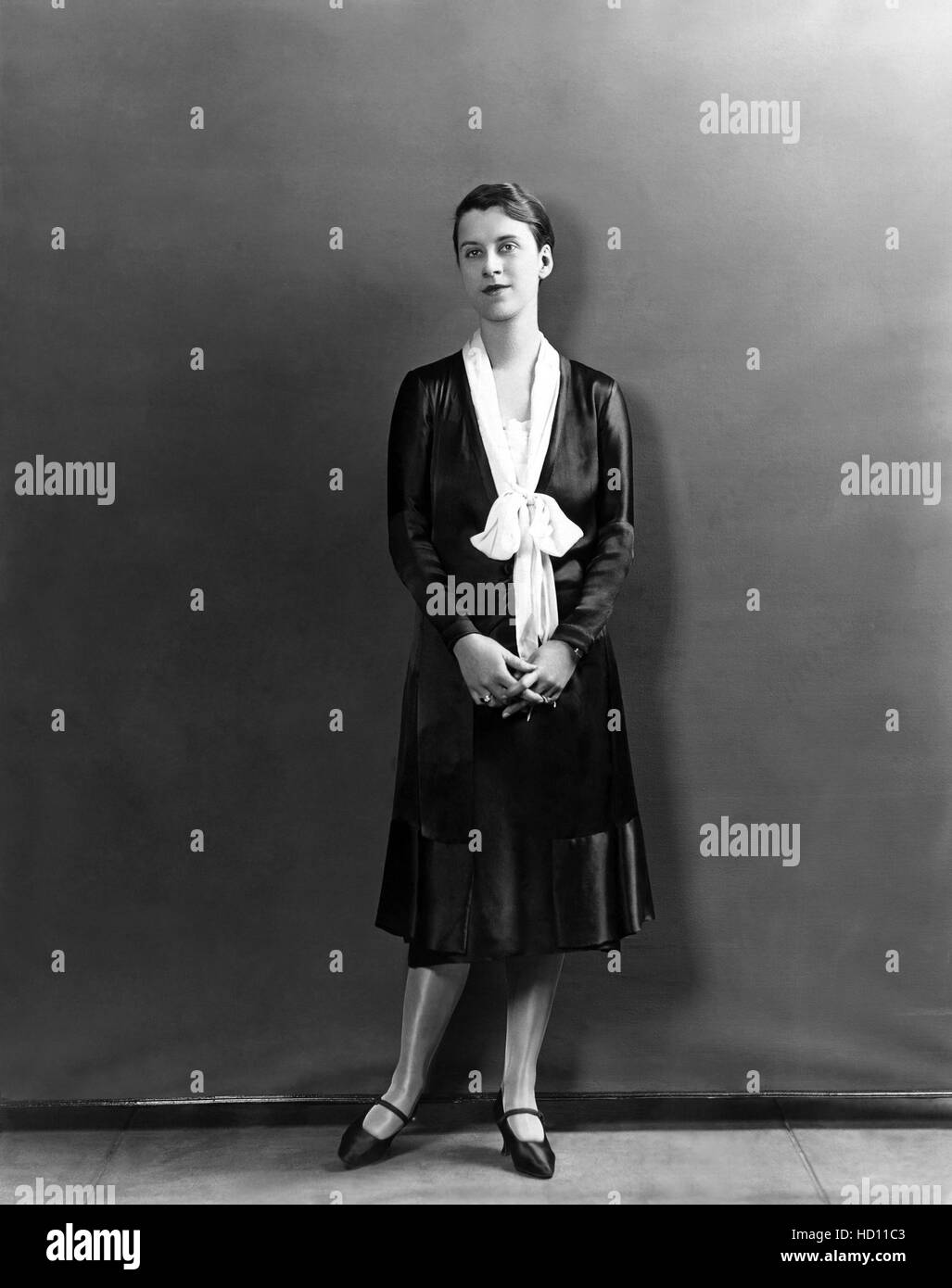 Beatrice Lillie, in a black frock with white georgette bow, by Lucien ...
