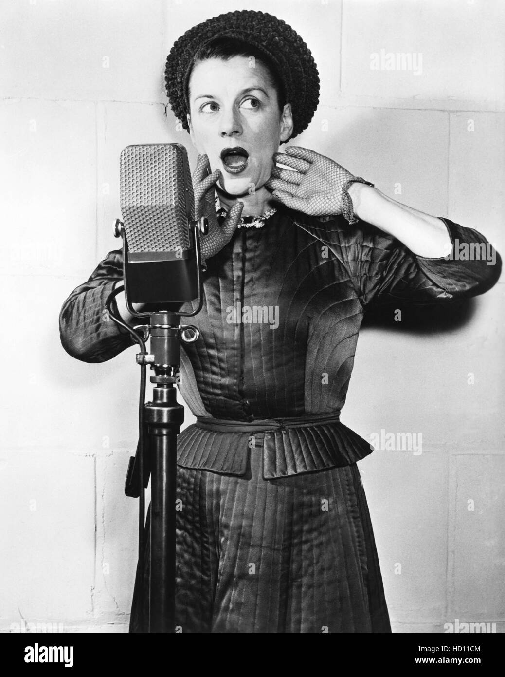 Beatrice Lillie at the microphone, 1940s Stock Photo - Alamy
