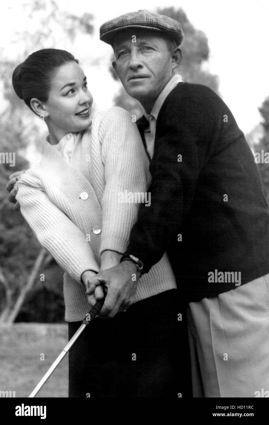 KATHRYN GRANT CROSBY gets a demonstration of husband BING CROSBY's ...