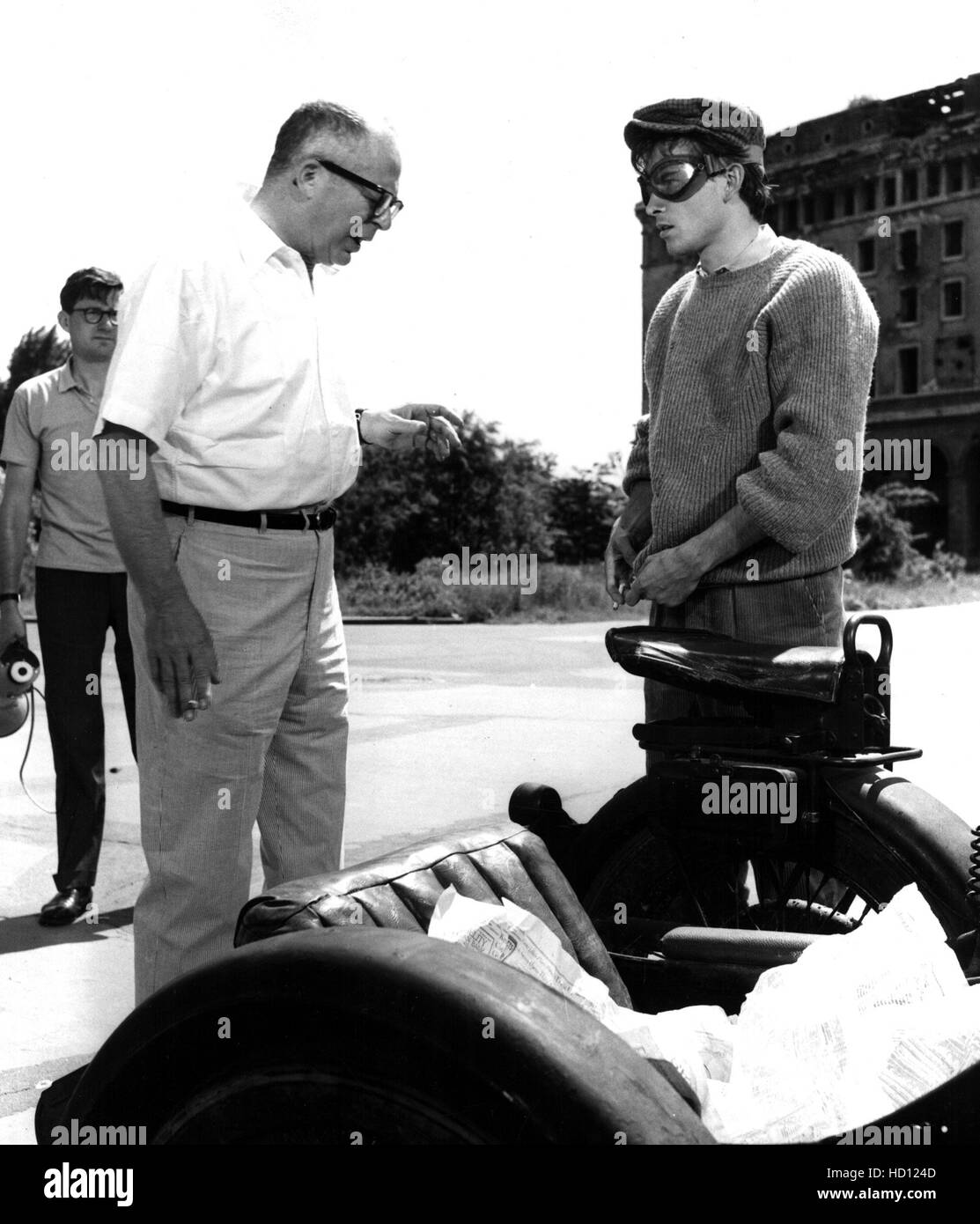 ONE, TWO, THREE, BILLY WILDER directs HORST BUCHHOLZ on location during ...