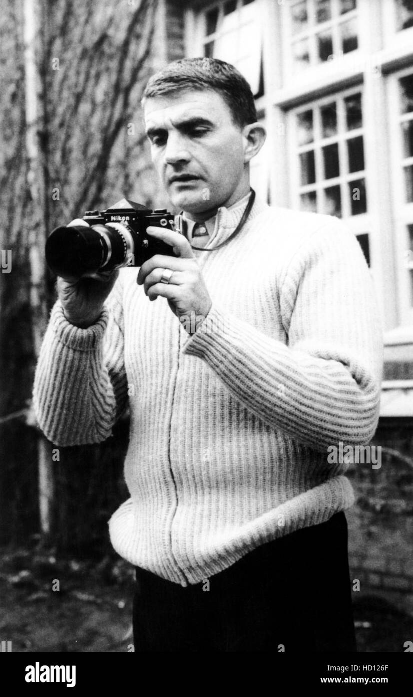 Blake Edwards, director, takes time to shoot a few pictures while he ...