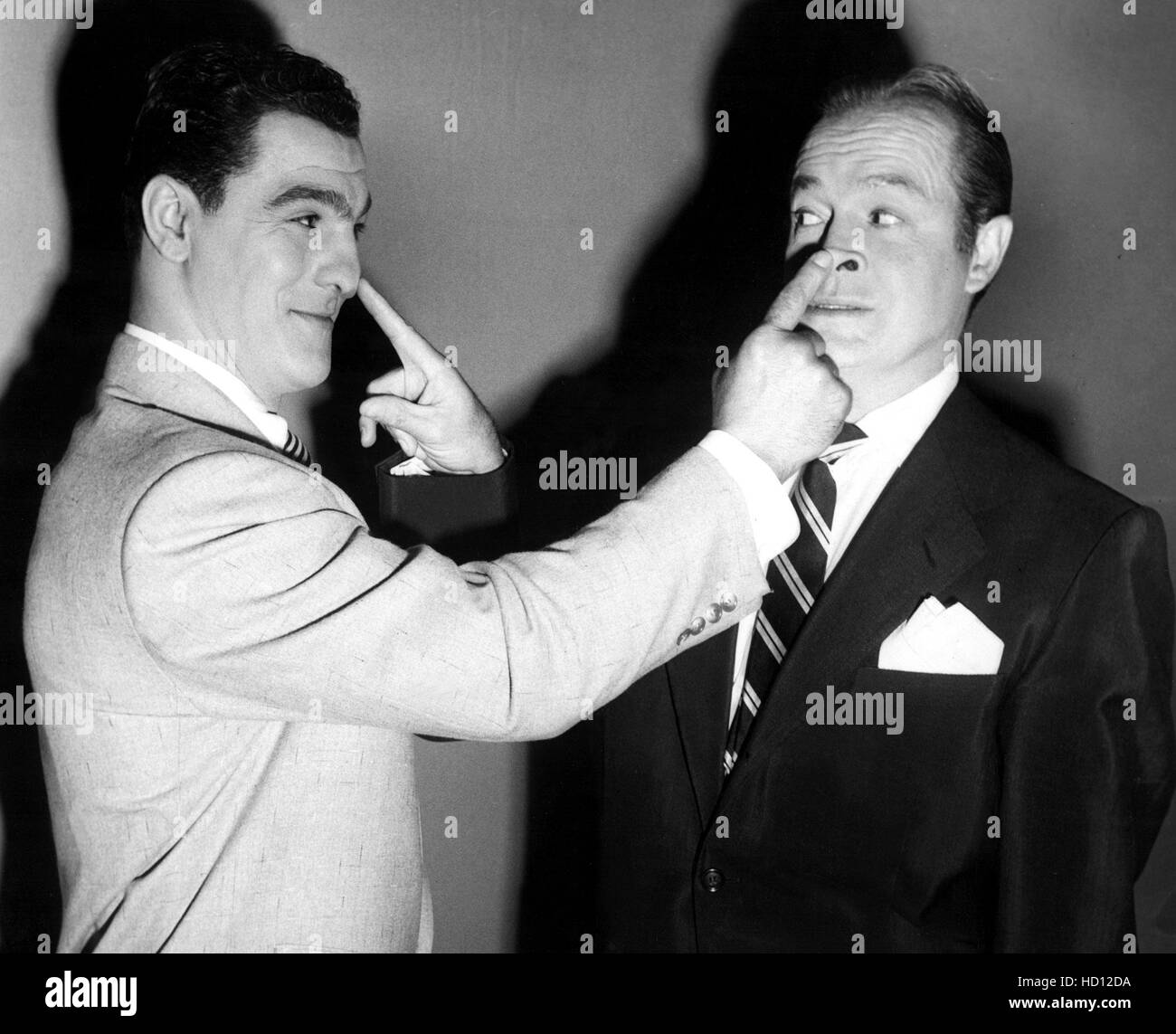Fighter ROCKY MARCIANO and comedian BOB HOPE compare their much ...