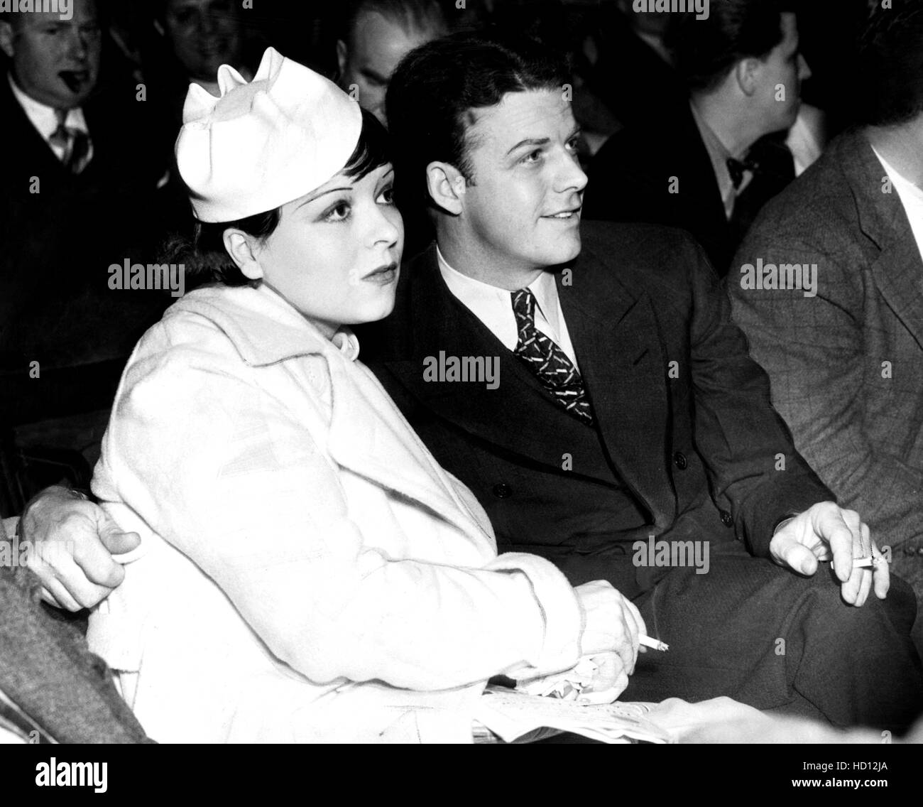 Clara Bow, left, and her husband, actor Rex Bell, at the boxing matches ...