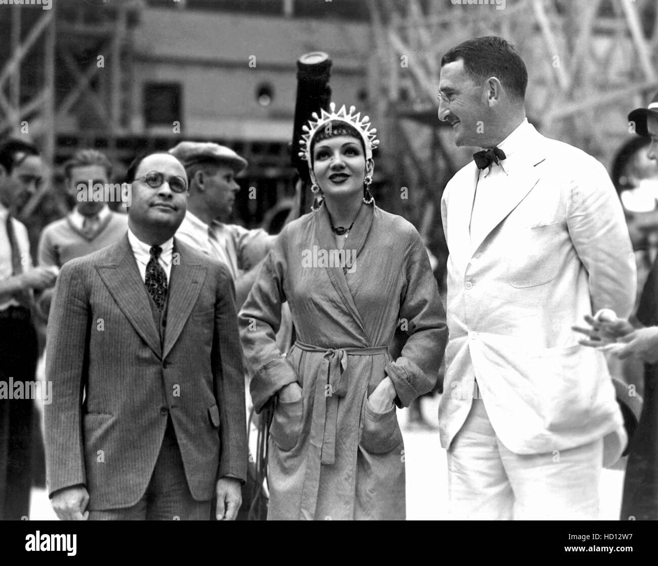 Paramount exec EMMANUEL COHEN with CLAUDETTE COLBERT and visitor JOSEPH ...