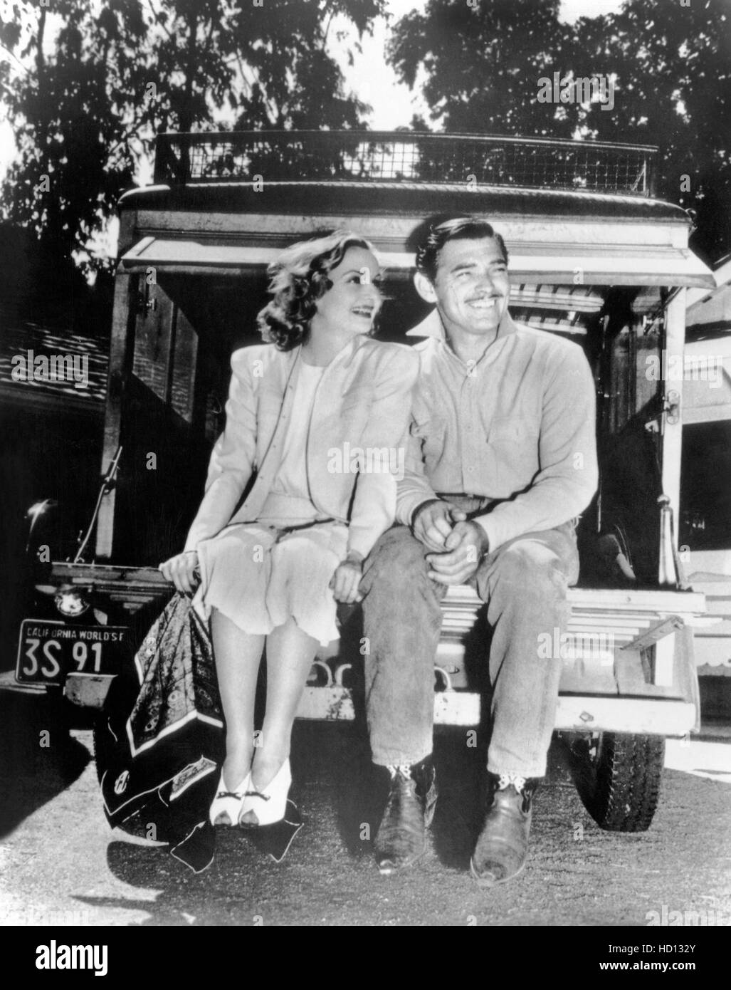 From left, Carole Lombard, Clark Gable, at their Encono ranch, 1939 ...