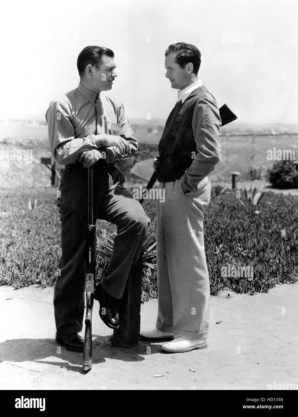 MGM stars CLARK GABLE and ROBERT MONTGOMERY enjoy a day of hunting ...
